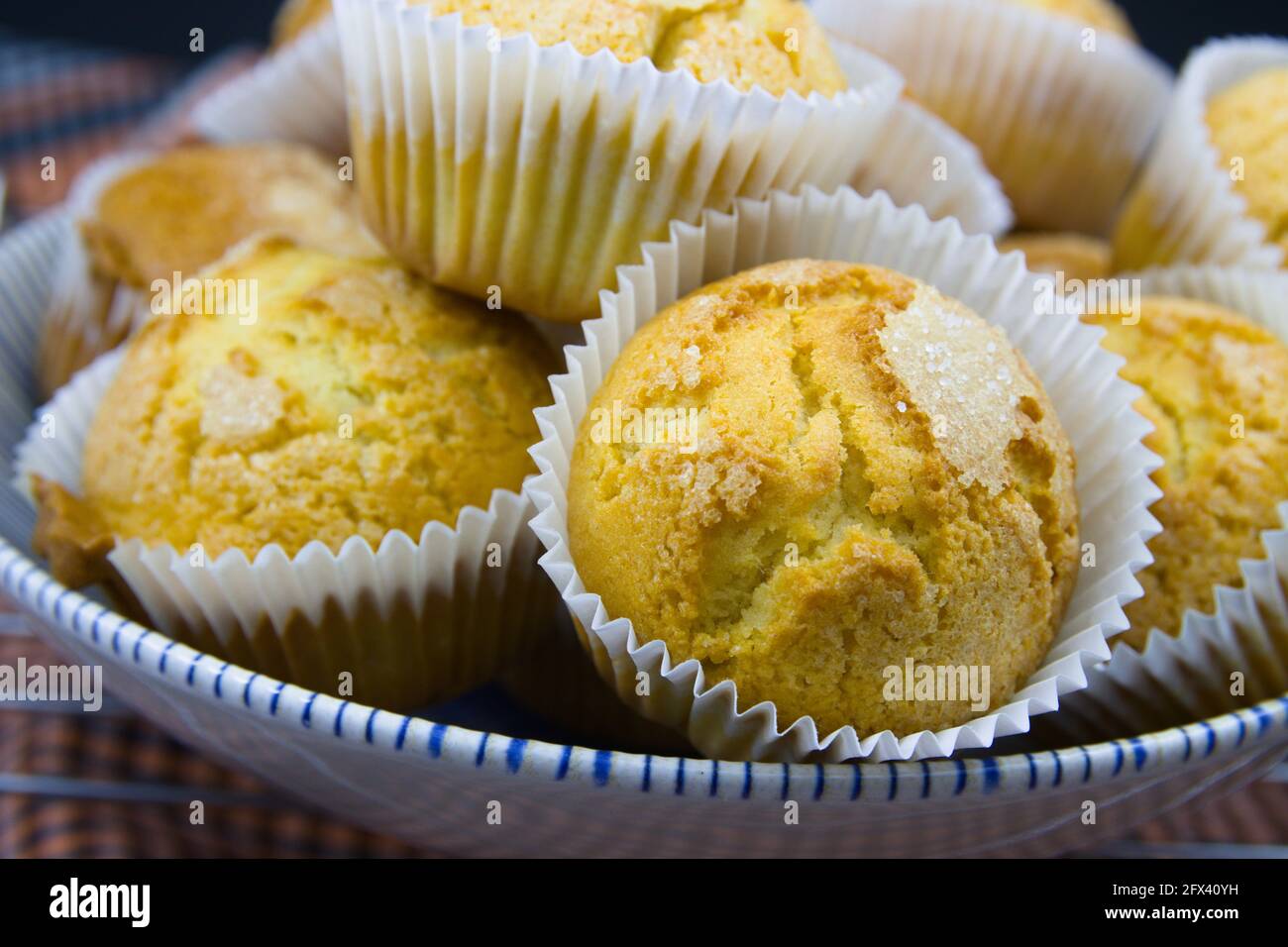 Closeup of a plate full of homemade muffins that are baked with the ...