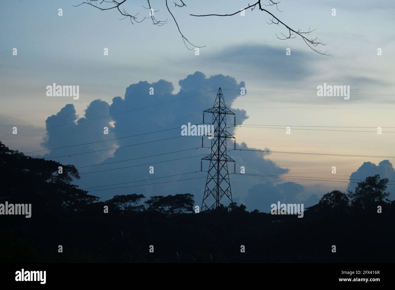 High voltage grid tower with wire cable at distribution station Stock ...
