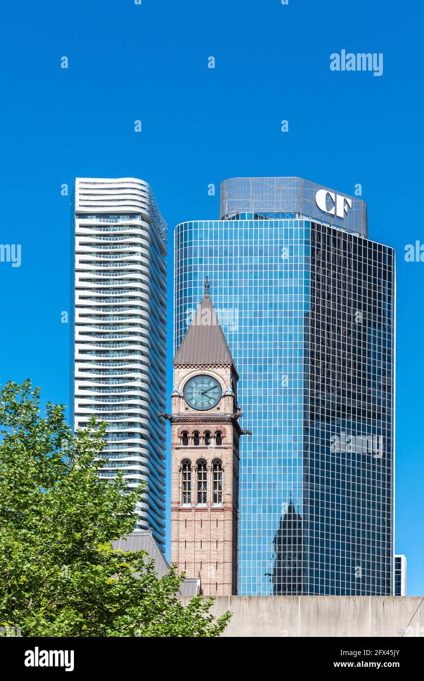 Old City Hall clock tower against the Massey Tower and the Cadillac ...