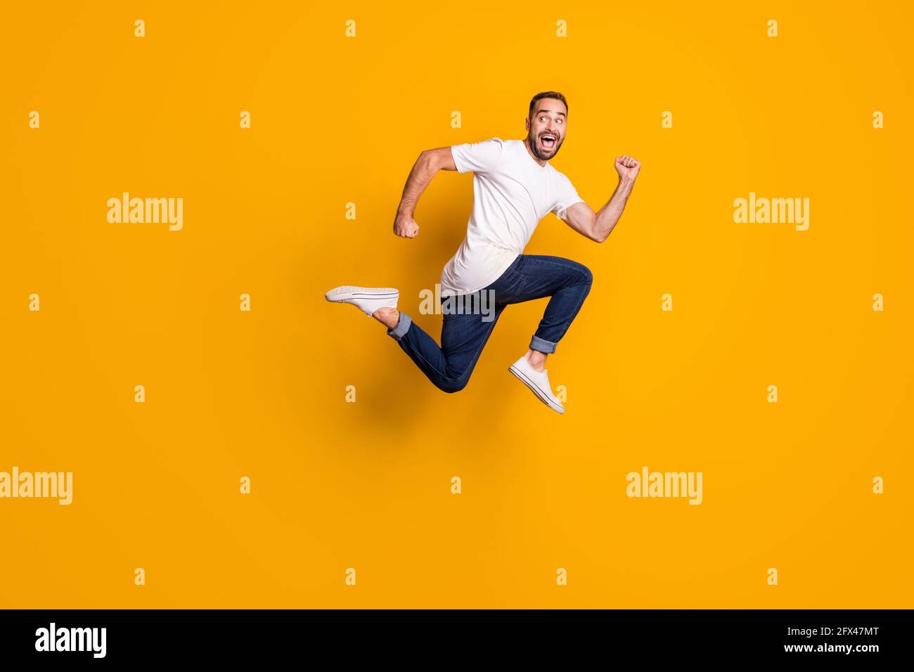 Full length body size side profile photo of jumping man running fast ...