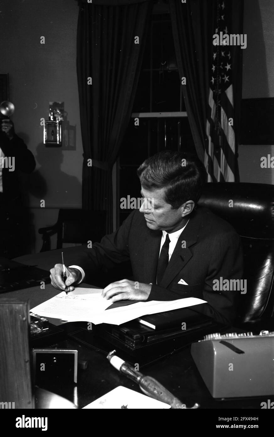 23 October 1962 President John F. Kennedy signing a proclamation ...