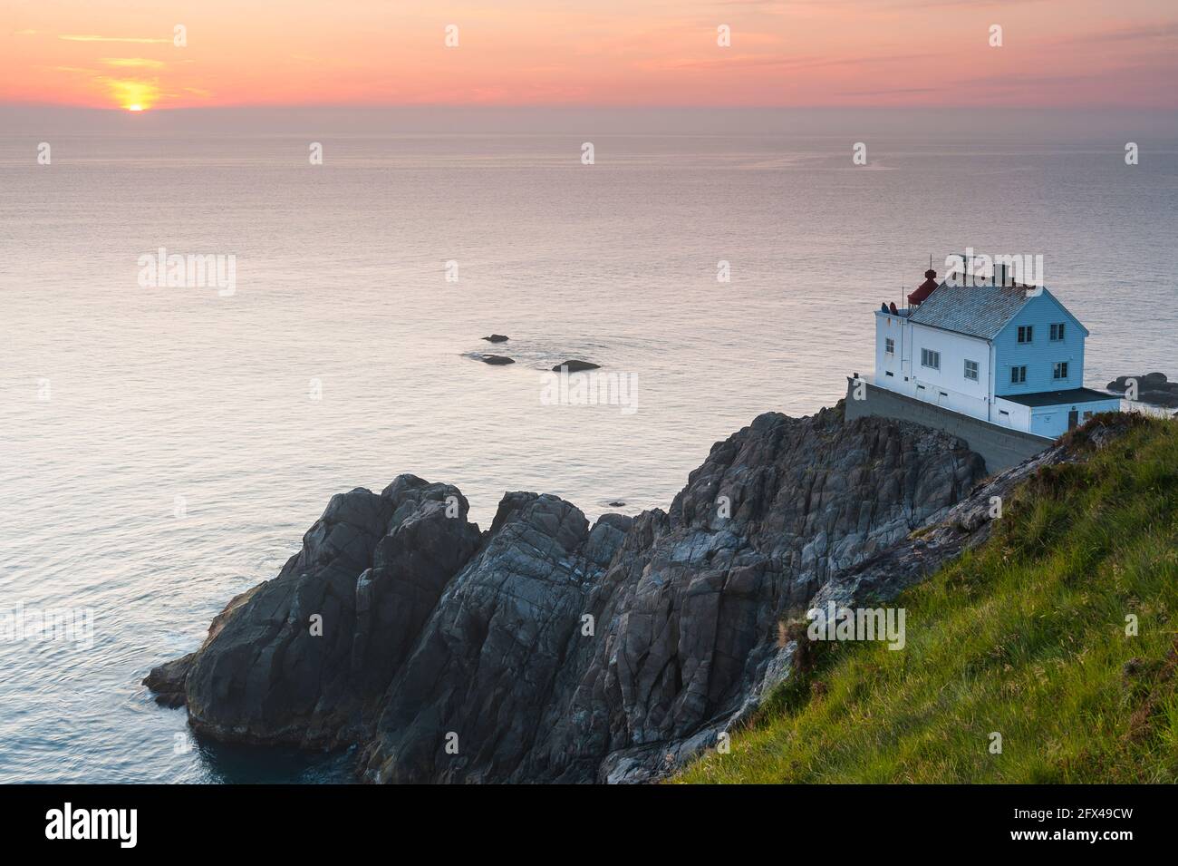 Lighthouse on the cliff edge Stock Photo - Alamy