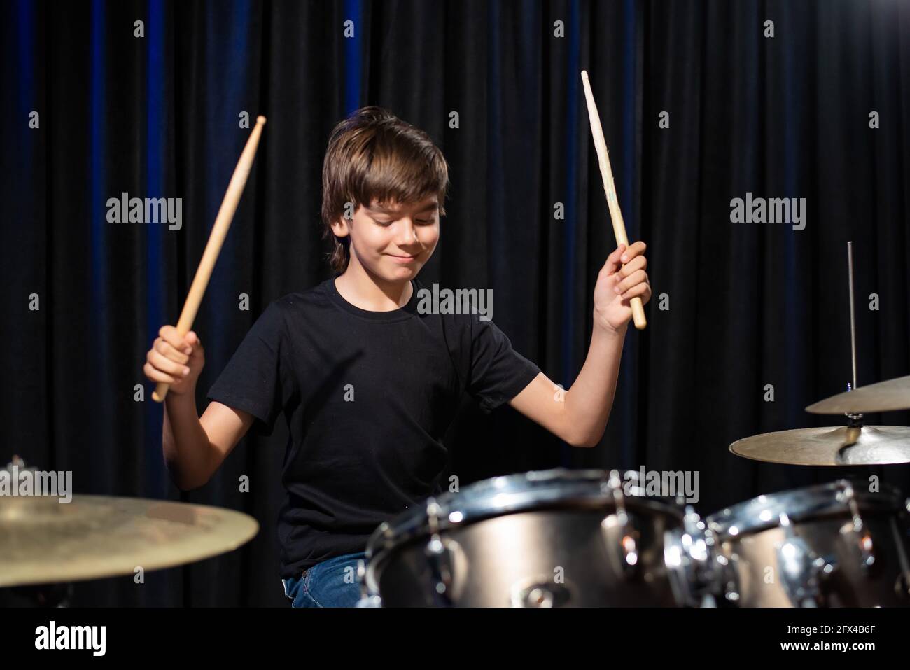 Children playing drums in school hi-res stock photography and images ...