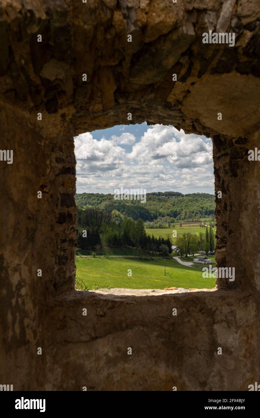 Beautiful view of green landscape and white clouds covering the blue ...