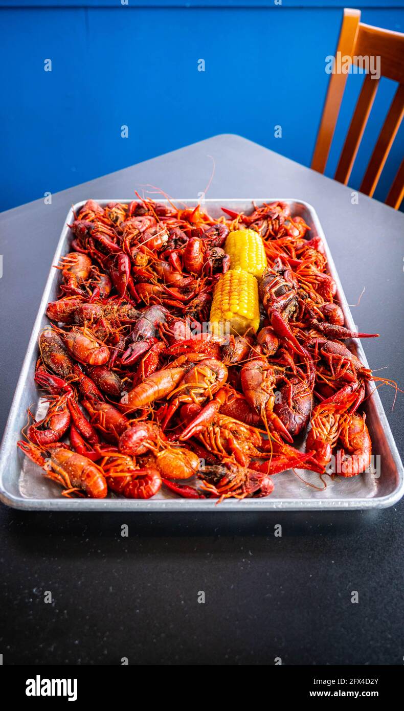 Boiled Crawfish and Yellow Corn on the cob Stock Photo - Alamy