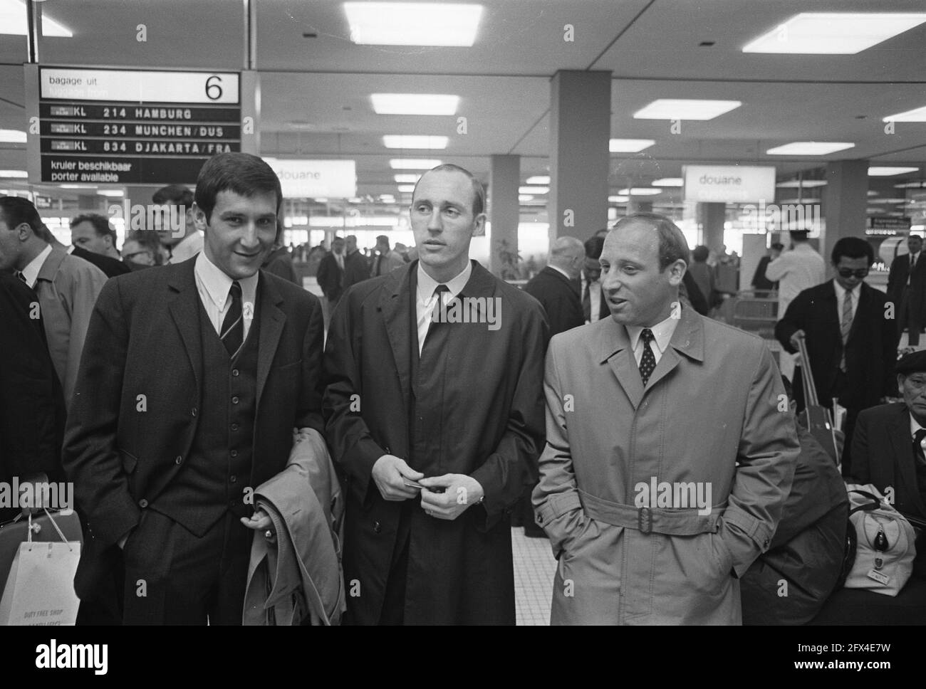 Arrival of HSV Hamburg at Schiphol Airport. Frans Honig, Willy Schultz ...