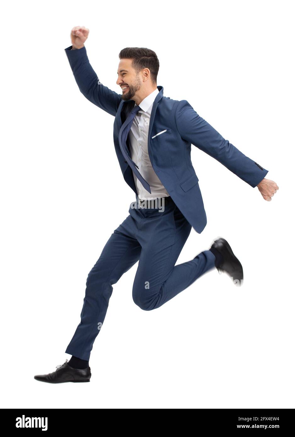 Young successful manager jumping in the air, isolated on white ...