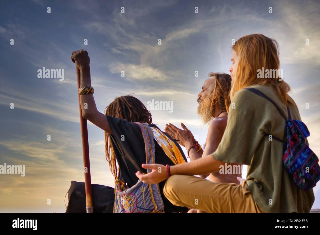 Woman sadhu meditating on ganges river hi-res stock photography and ...