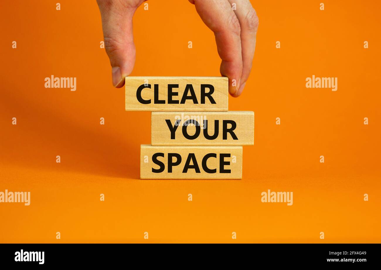 Clear your space symbol. Wooden blocks with words 'Clear your space ...