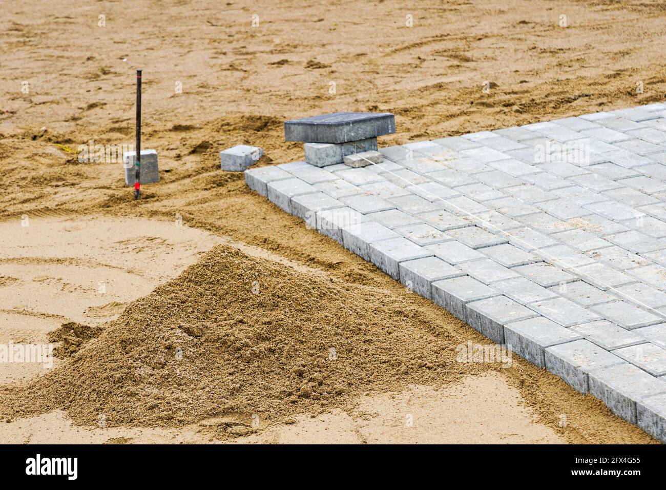 view of the pavement construction site, concrete slabs and the prepared ...