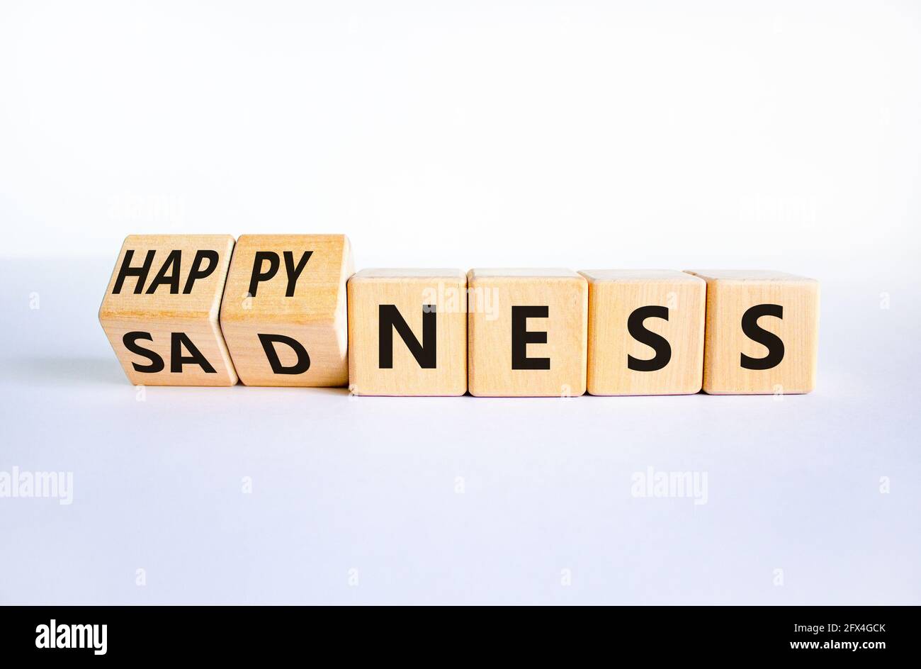 Happyness or sadness symbol. Turned cubes and changed the word 'sadness ...
