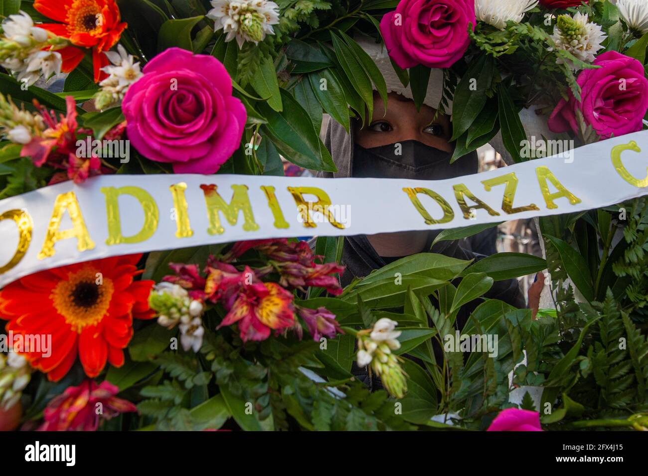 Several people gather at Plaza de Bolivar in front of the Congress ...