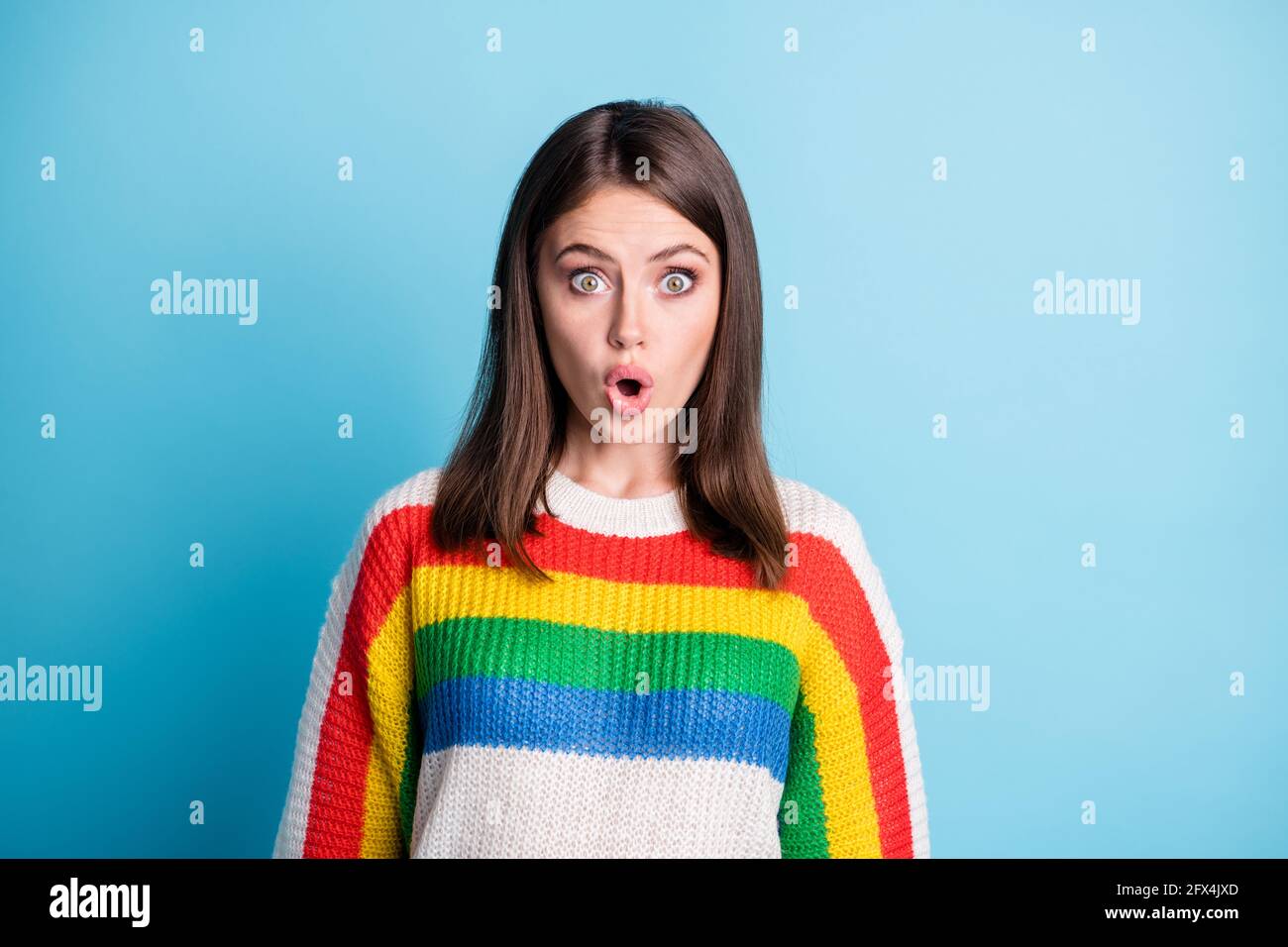 Portrait of attractive funny amazed girl pout lips wear knitted sweater ...