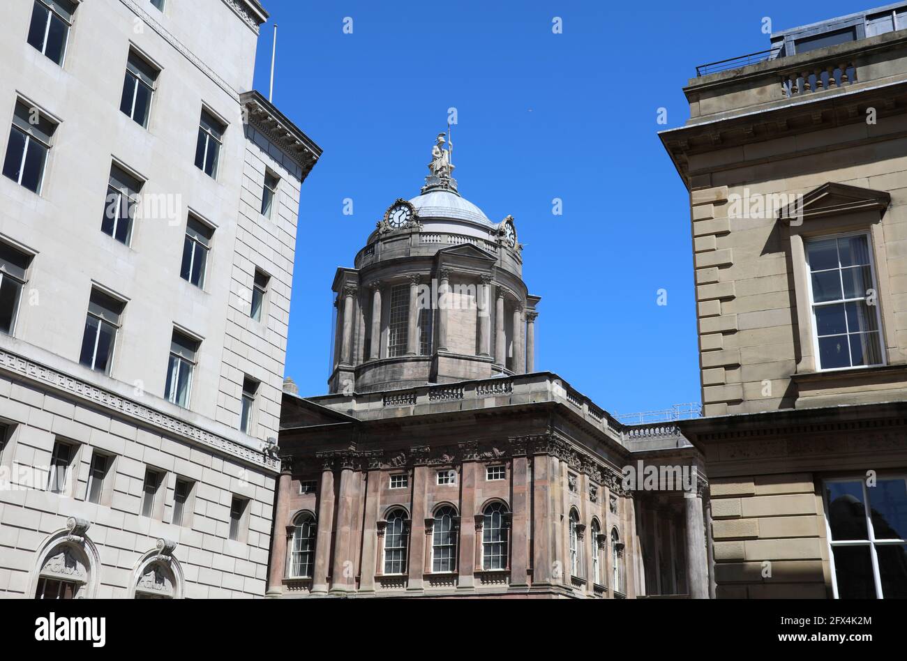 Liverpool Town Hall building with the statue of Roman goddess Minerva ...