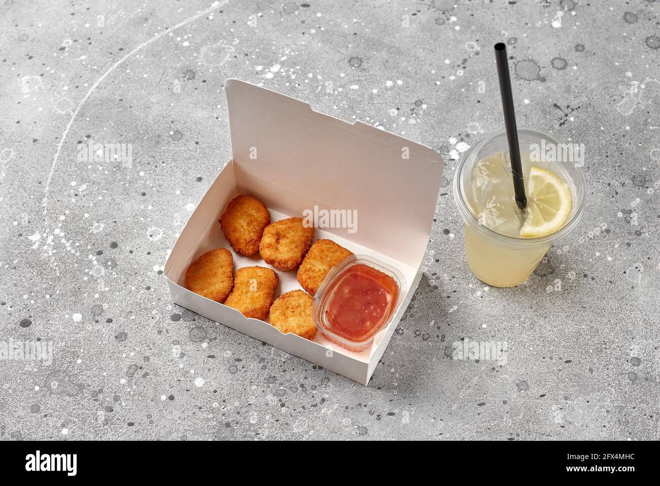 food delivery, takeaway food in paper containers with hot chicken ...