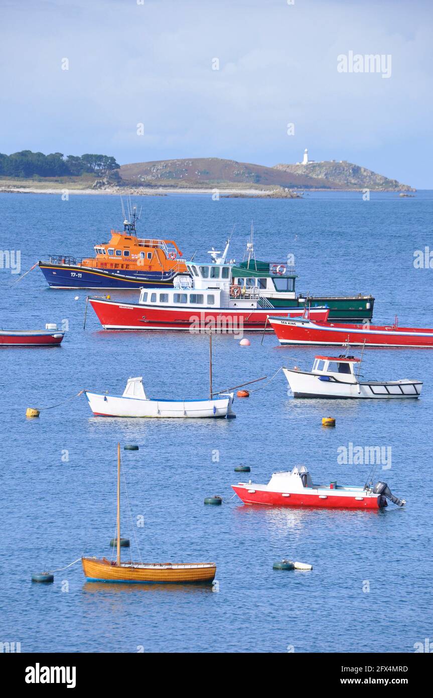 A calm sunny late afternoon view of the lifeboat and tourist ferry ...