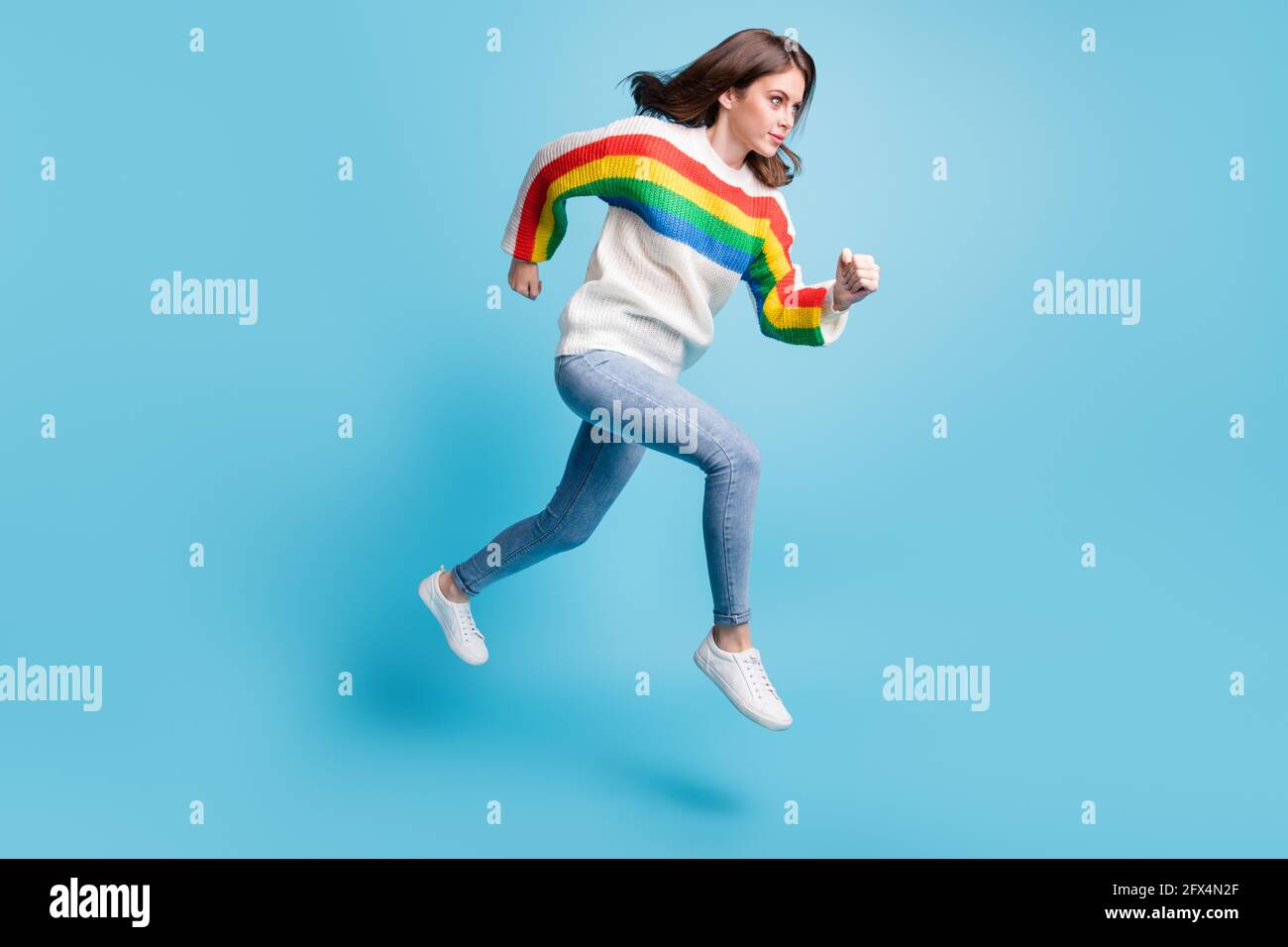 Full length body size view of pretty motivated girl jumping running ...