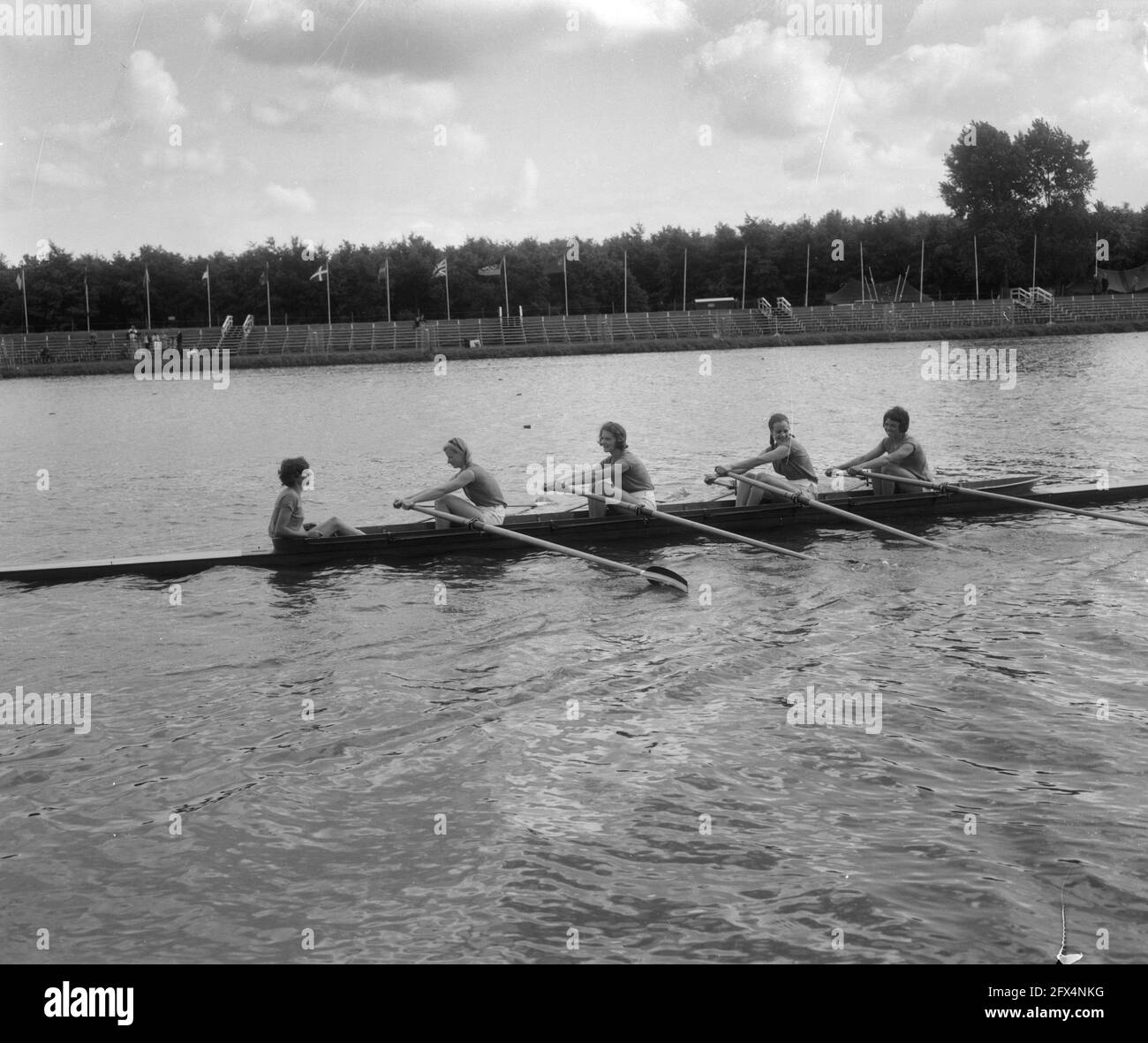 Four ladies rowing Black and White Stock Photos & Images - Alamy