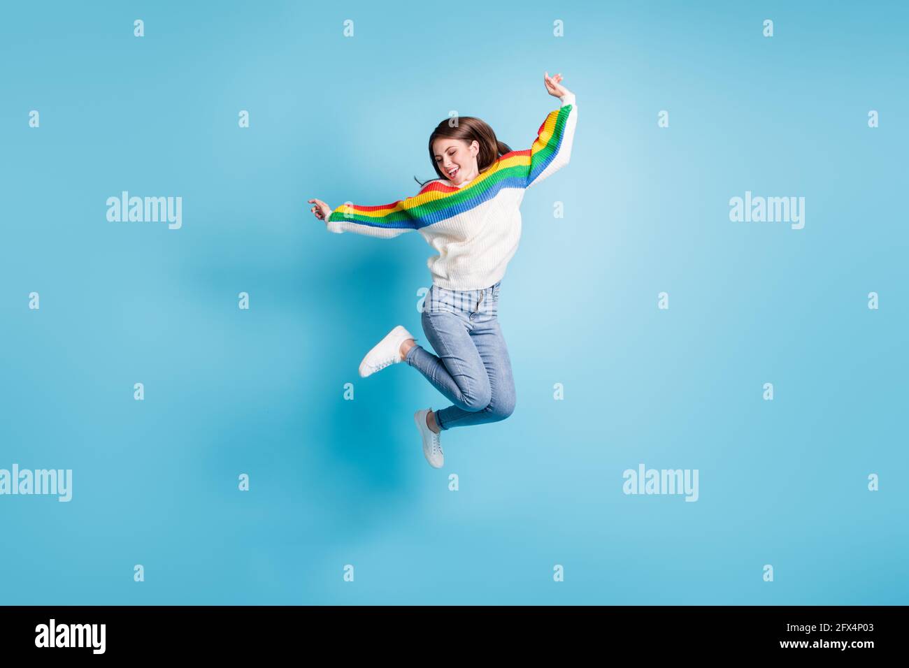 Full size photo of optimistic nice brunette lady jump wear sweater ...