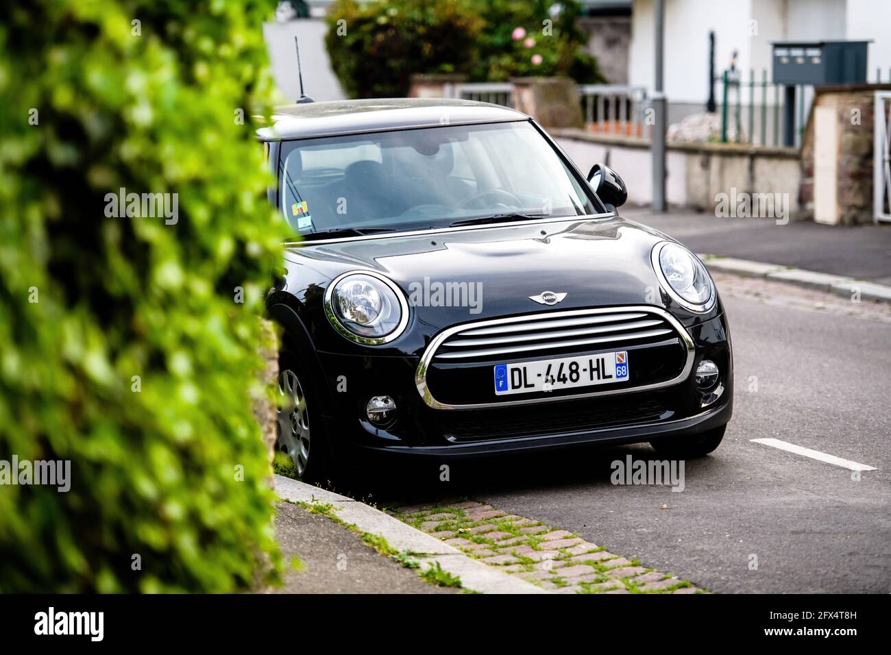 New British Mini Cooper car parked in the city on a street Stock Photo ...
