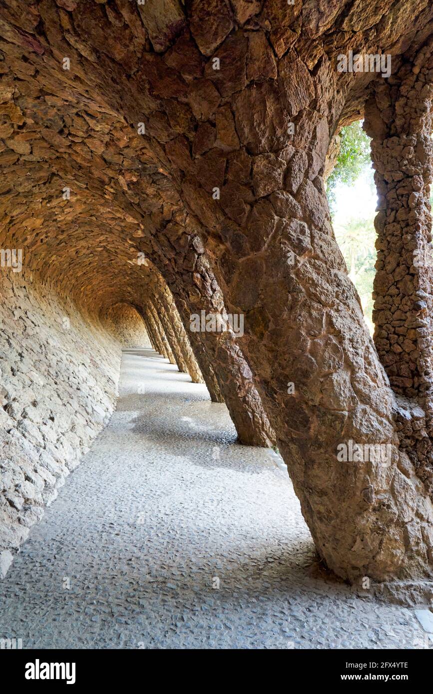 Barcelona. Catalonia. Spain. A colonnaded pathway in Park Guell ...