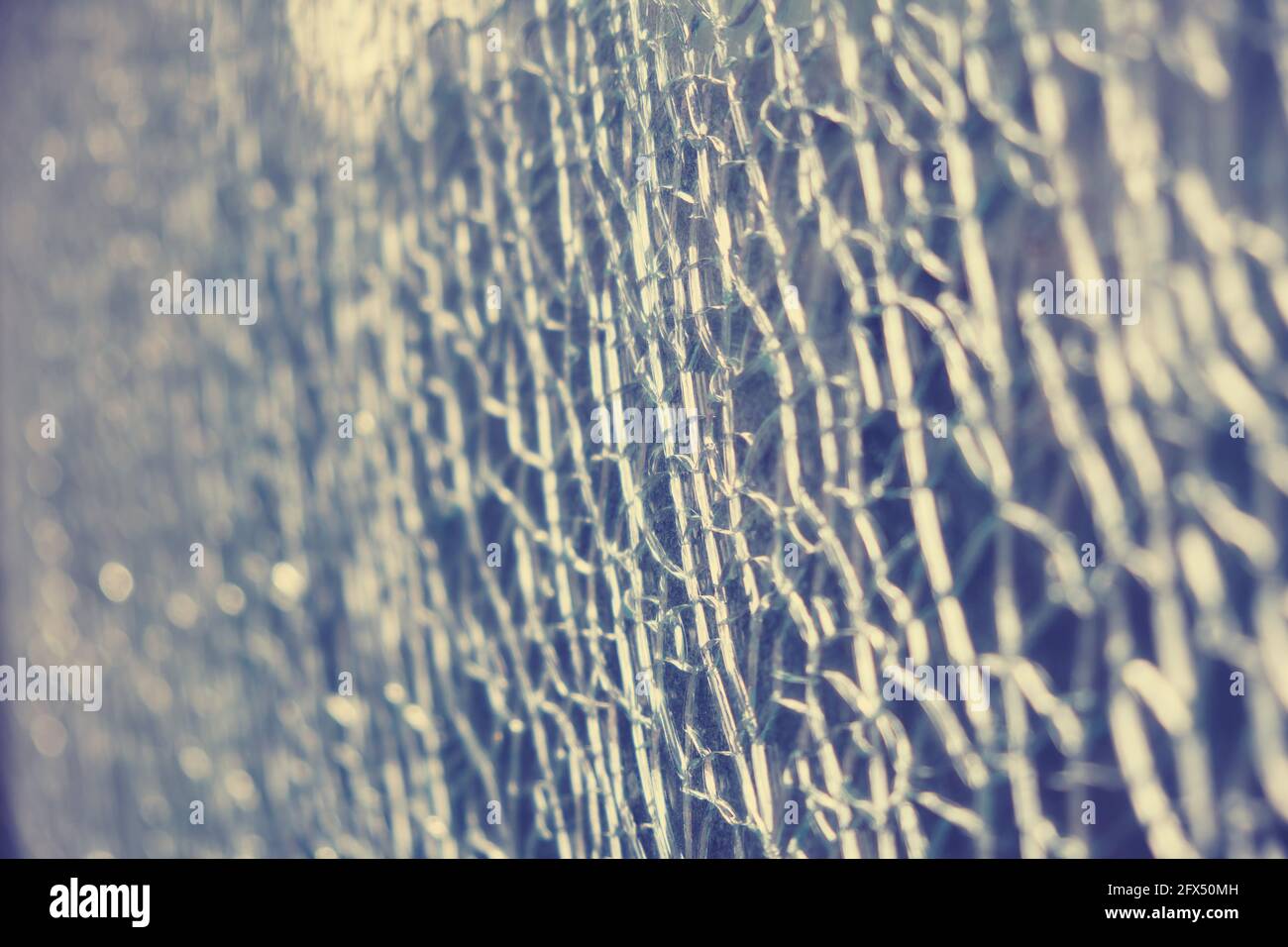 Colorless background of cracks on broken glass, texture Stock Photo - Alamy