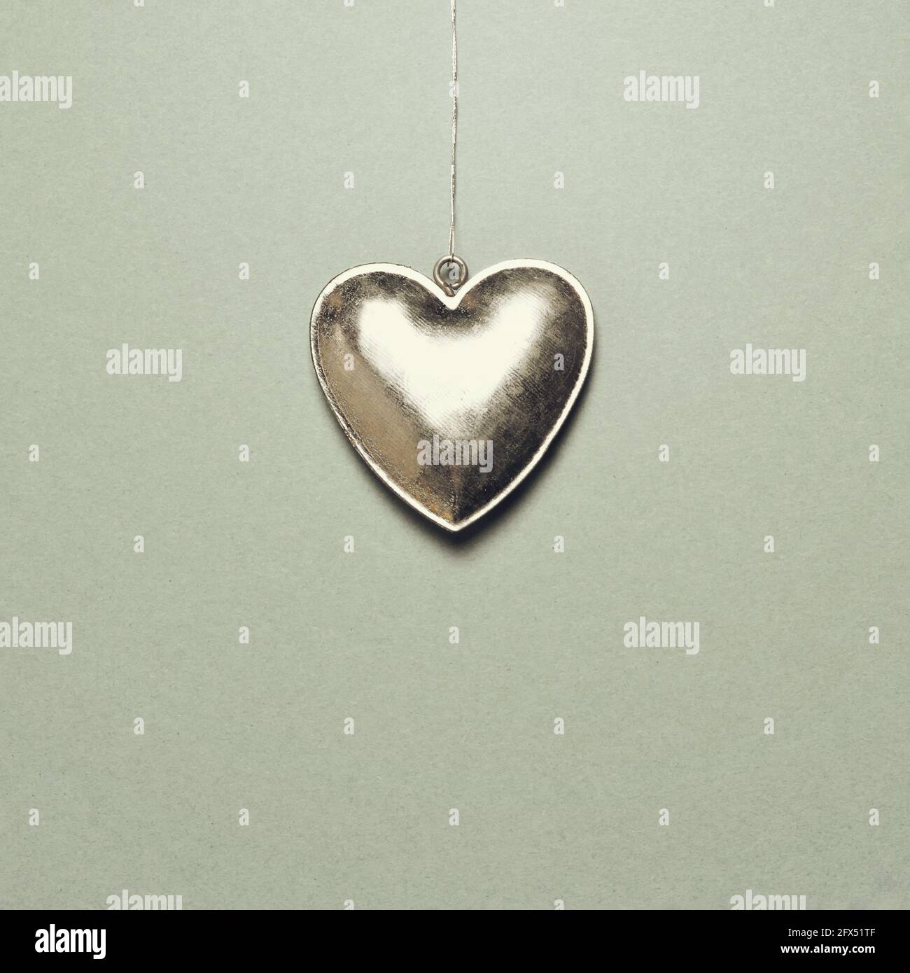 Hanging metal heart hi-res stock photography and images - Alamy