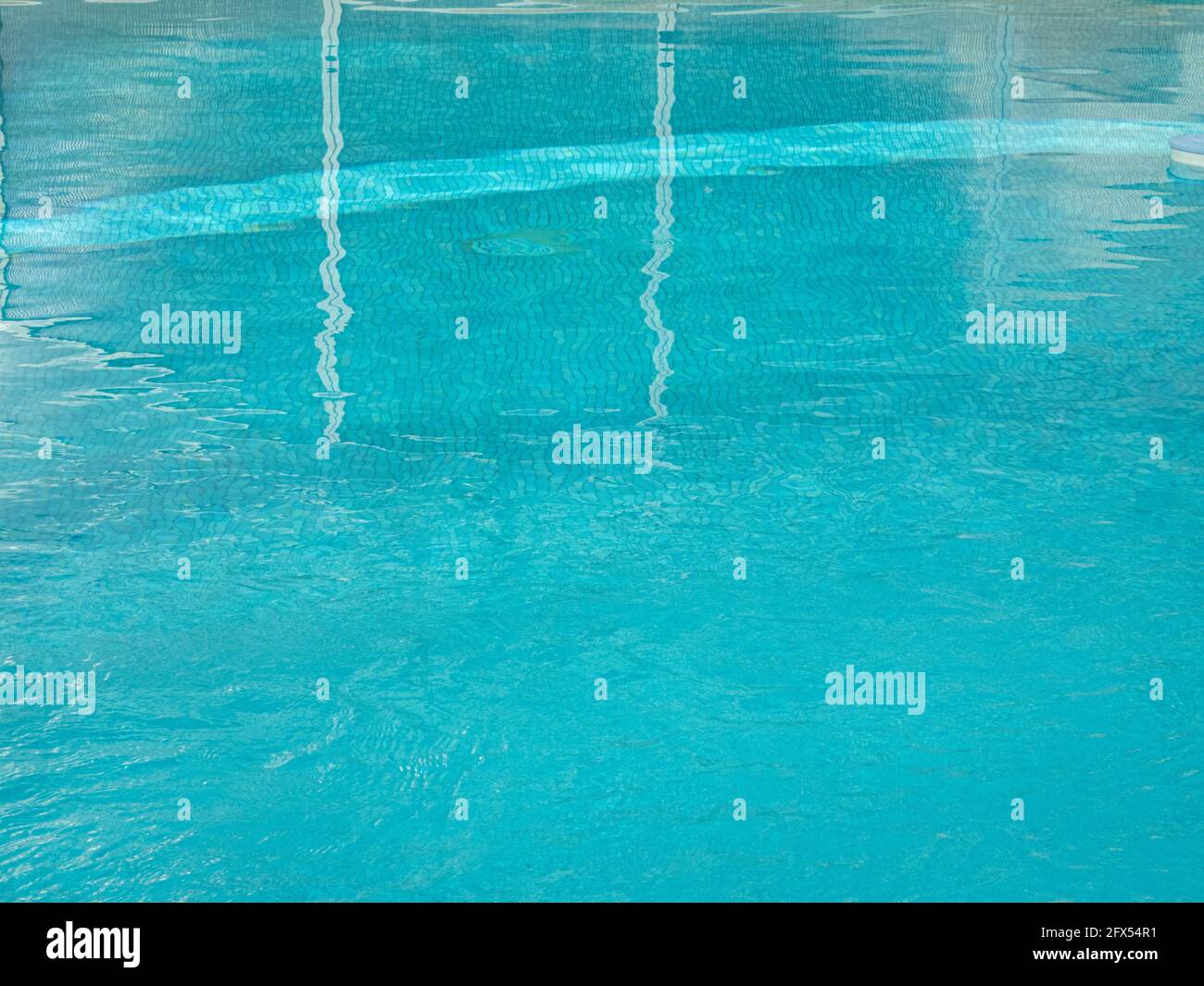 Clear blue water in a swimming pool in summer Stock Photo - Alamy