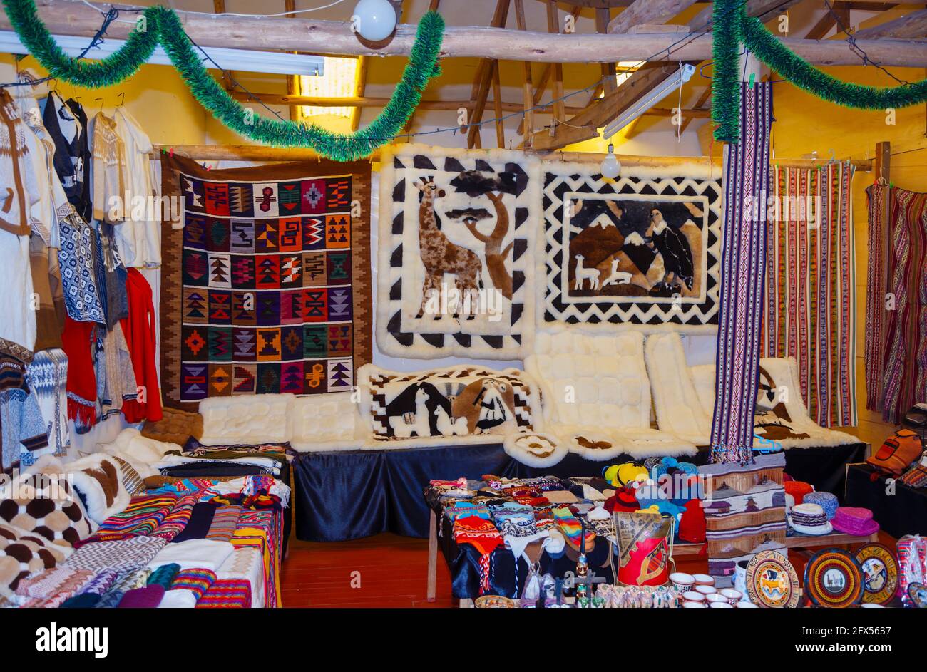 The interior of a souvenir shop in Chinchero, a small Andean rustic ...