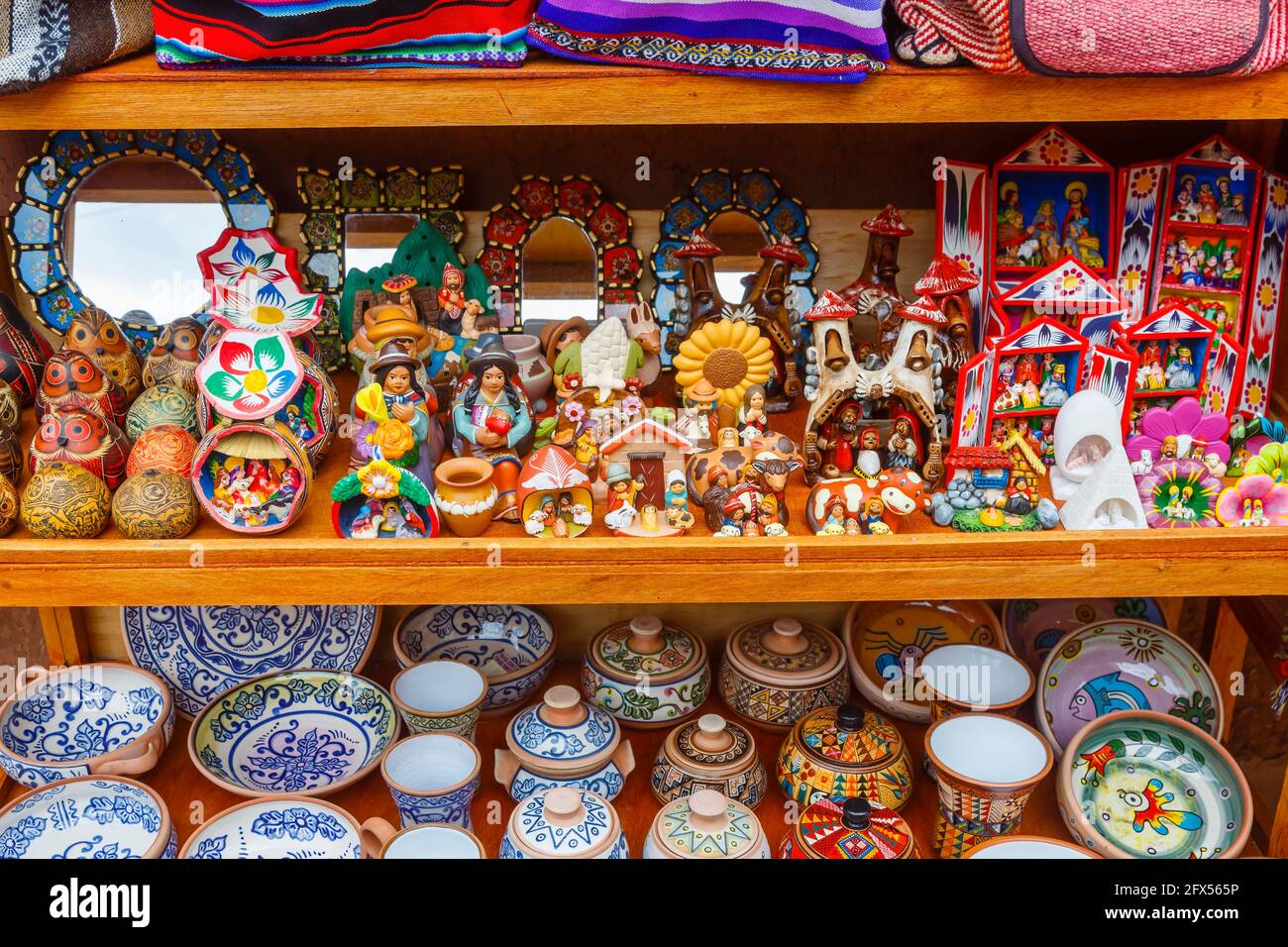 Display of typical local souvenirs outside a shop in Chinchero, a ...