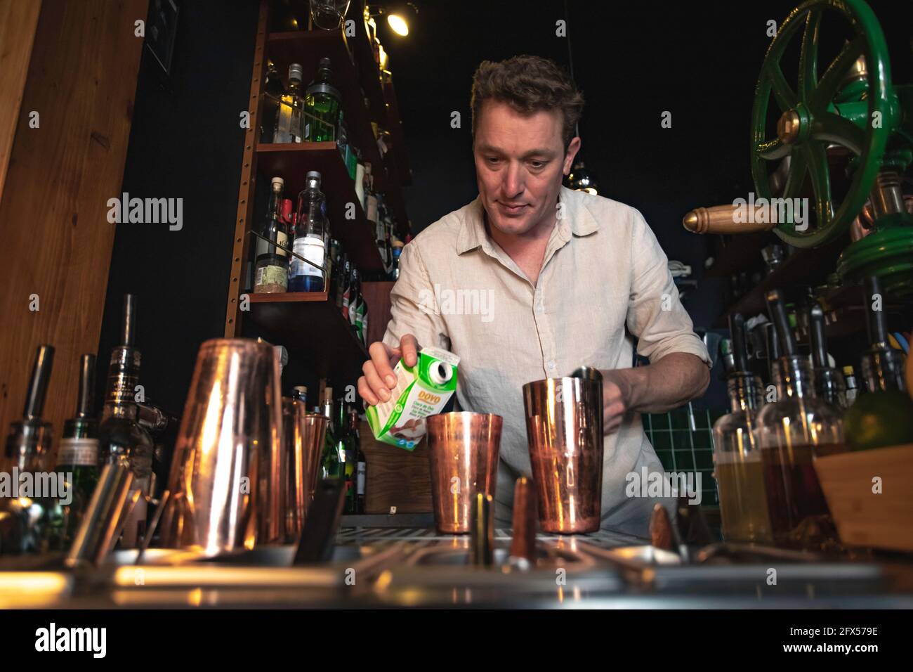Liquor Bottles Behind Bar High Resolution Stock Photography and Images ...