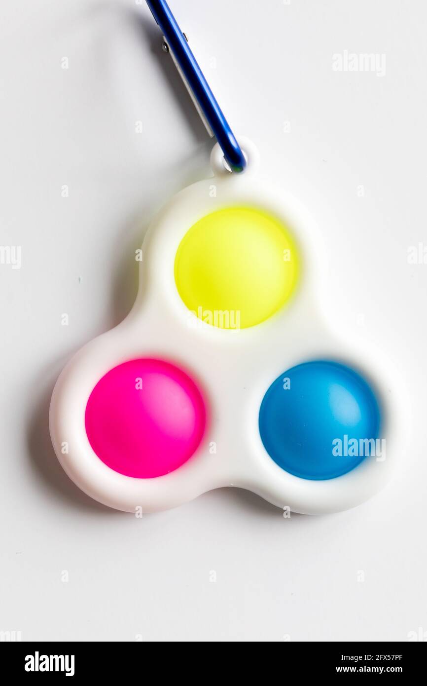 Simple Dimple Fidget toy, colorful anti-stress game isolated on white ...
