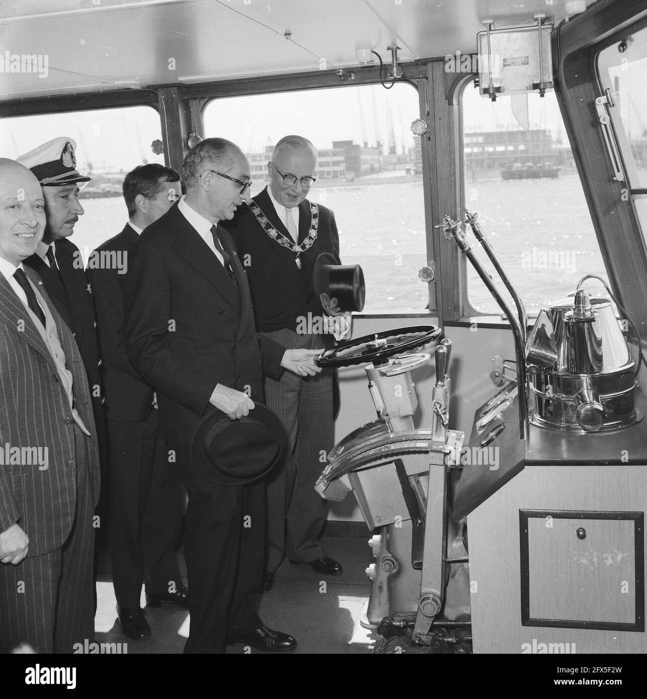 Frondiri in Rotterdam, Frondiri at the wheel of the Pieter Calland with ...