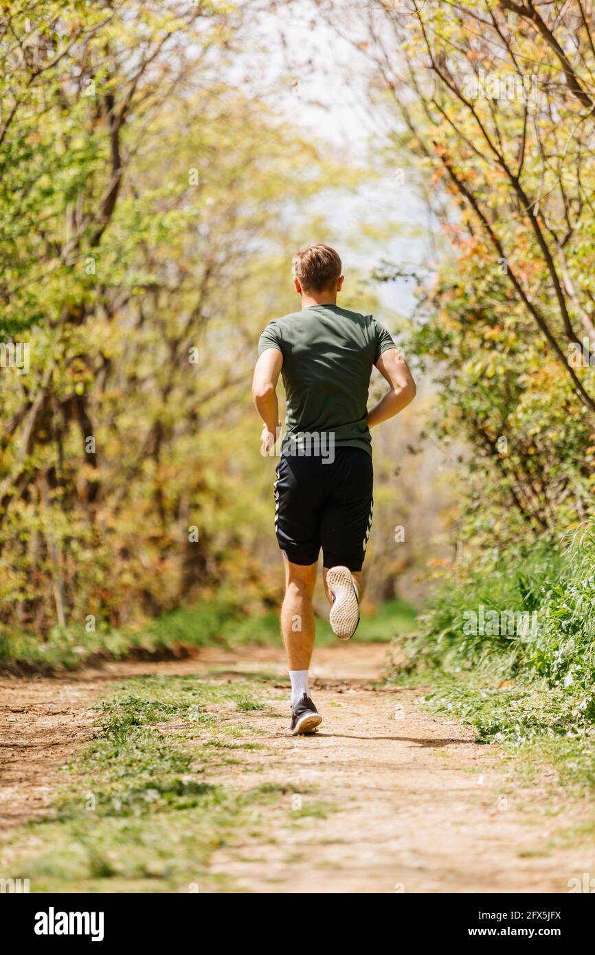 Man Jogging In Park