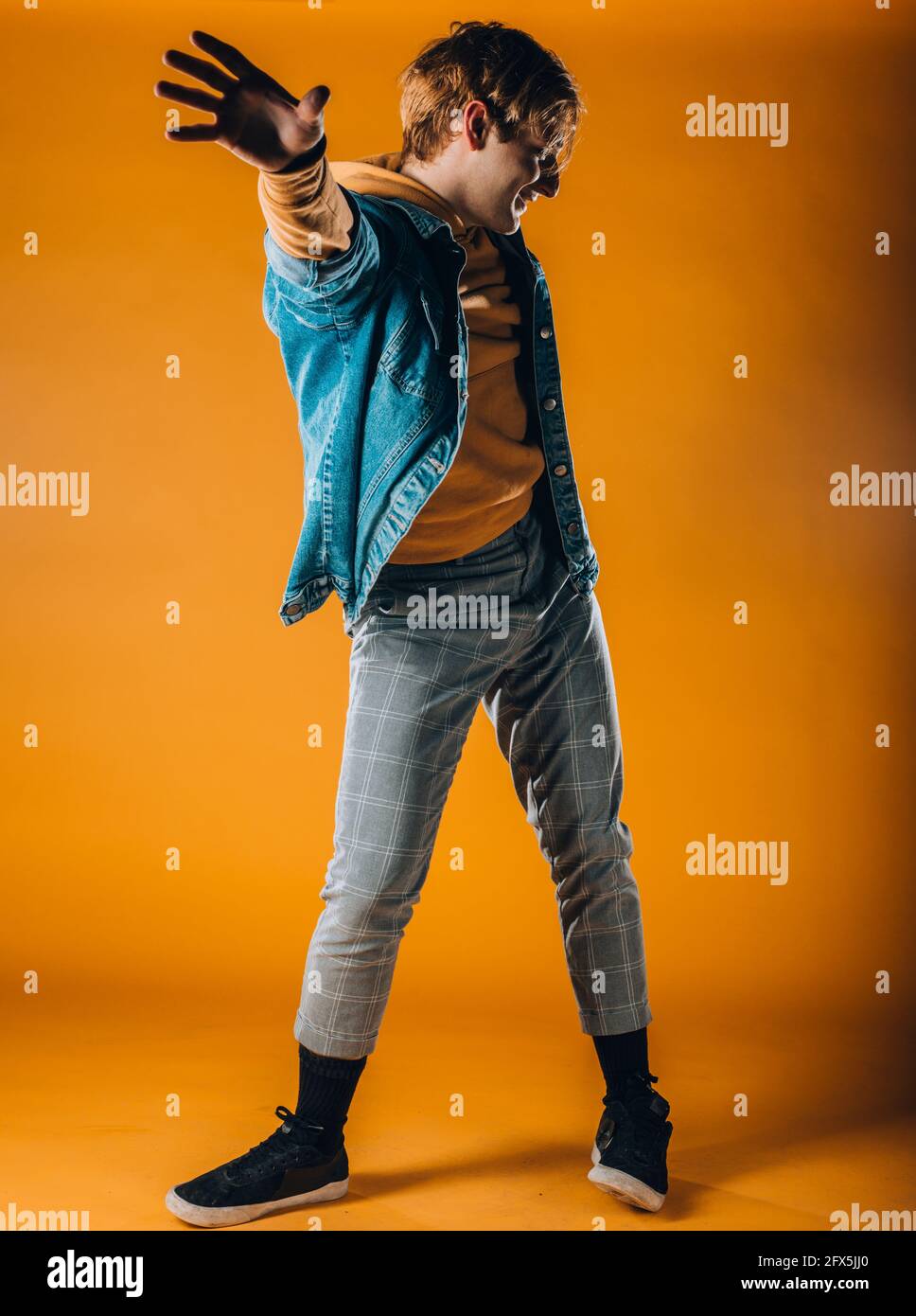 Athletic dancer performing an element of dance gymnastics Stock Photo ...