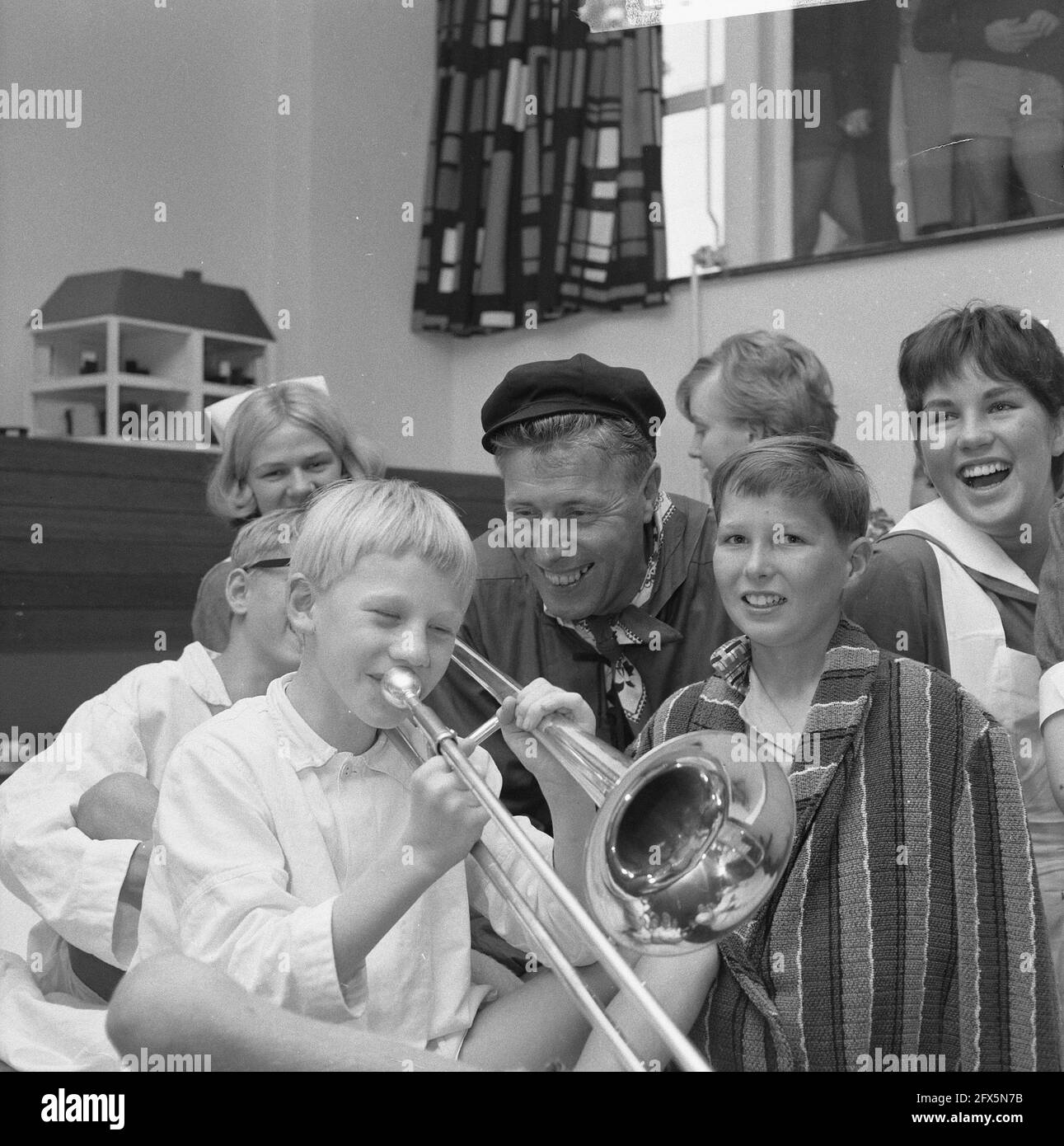 Boy plays trombone hi-res stock photography and images - Alamy