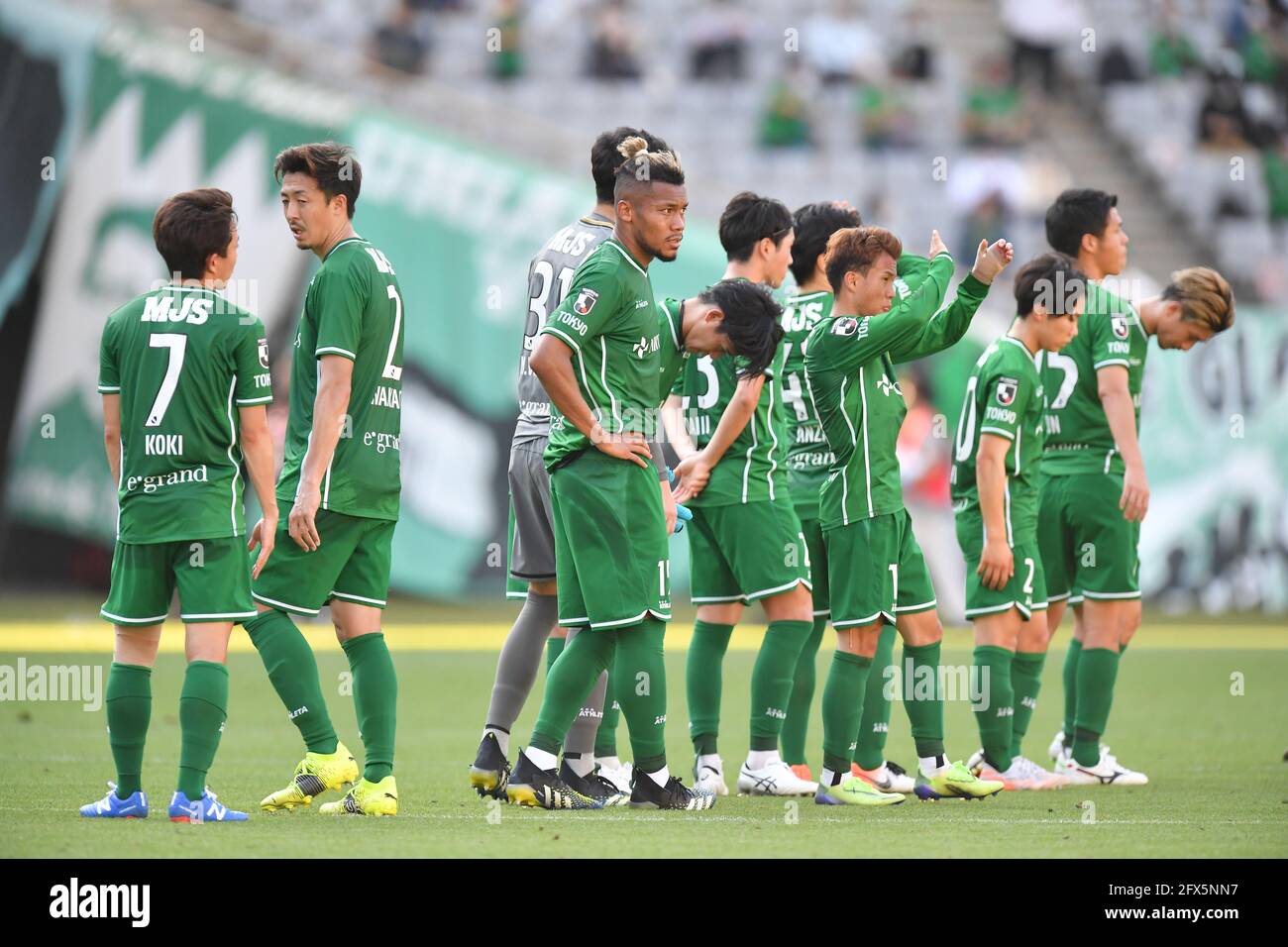 Tokyo, Japan. 23rd May, 2021. Tokyo Verdy players look dejected after ...