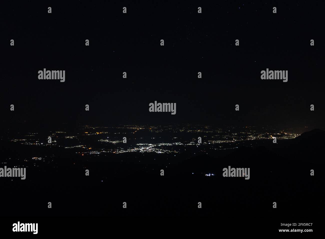 City light night view in black background showing its industrialization ...