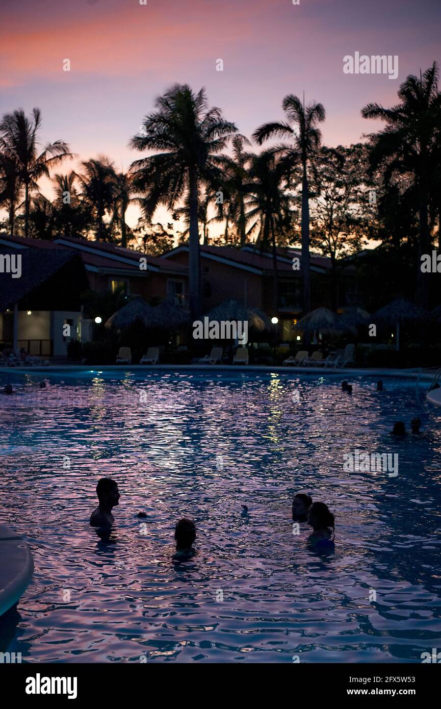 Sunset over pool at resort in Tamarindo, Costa Rica, Central America ...