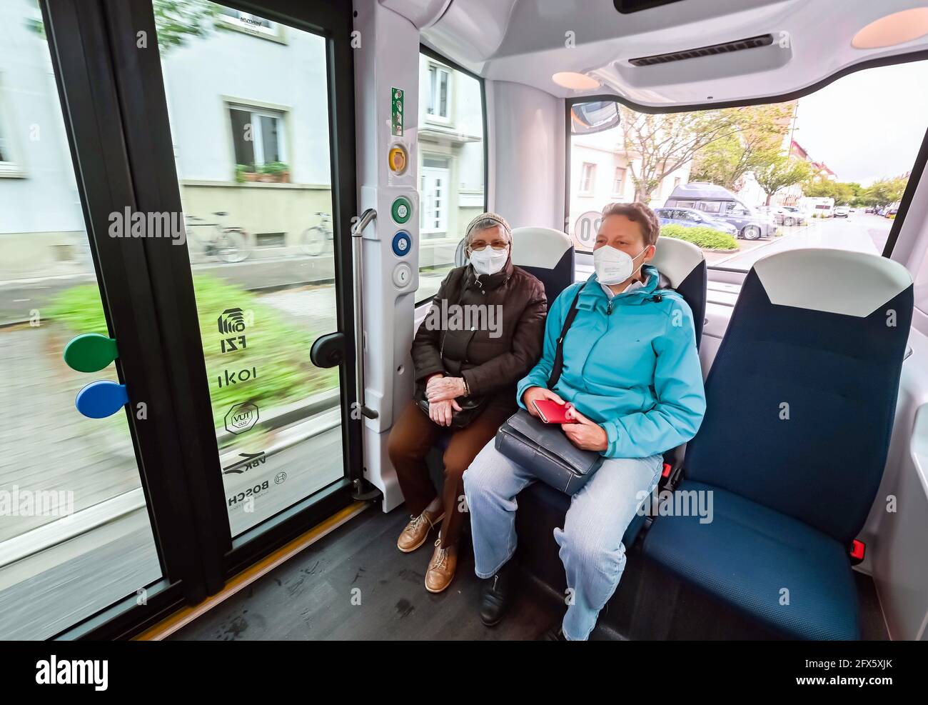 Karlsruhe, Germany. 17th May, 2021. Sieglinde Vater (l) drives with her ...