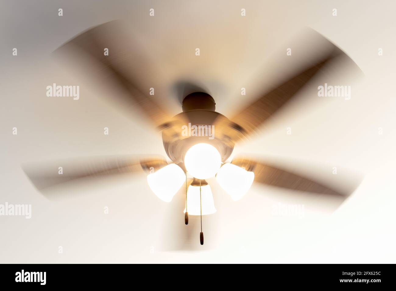Ceiling fan in motion hi-res stock photography and images - Alamy