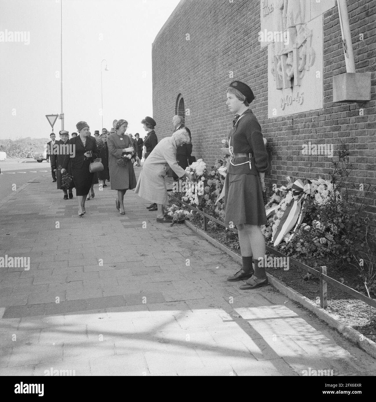 Commemoration in Oranjehotel at Scheveningen. Wreath laying at wall of ...