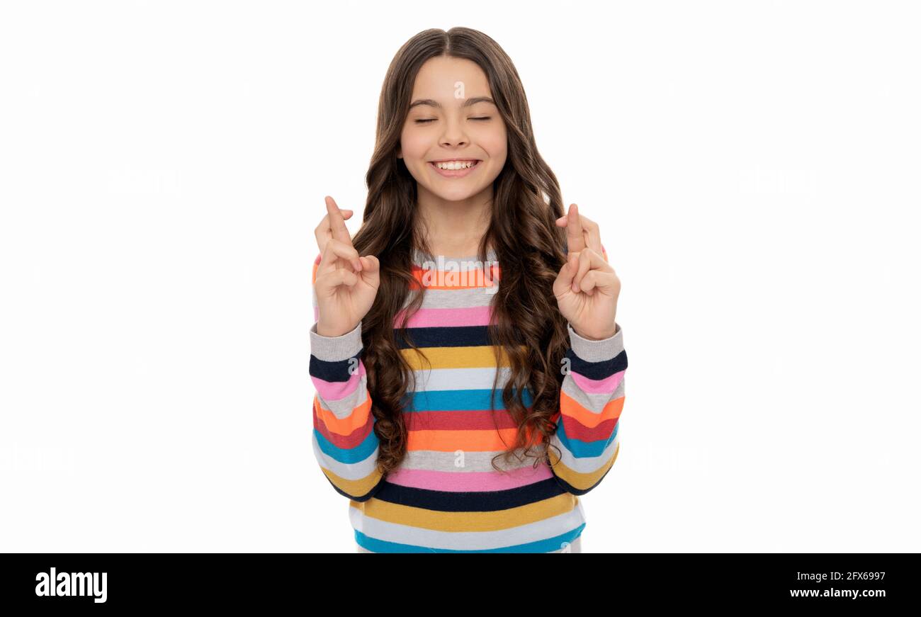 Happy child dreamer make wish keeping fingers crossed isolated on white ...