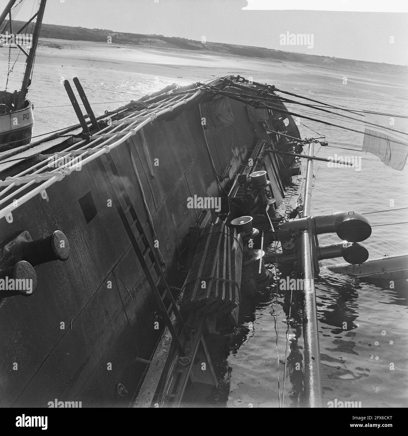 Capsized cargo ship Black and White Stock Photos & Images - Alamy