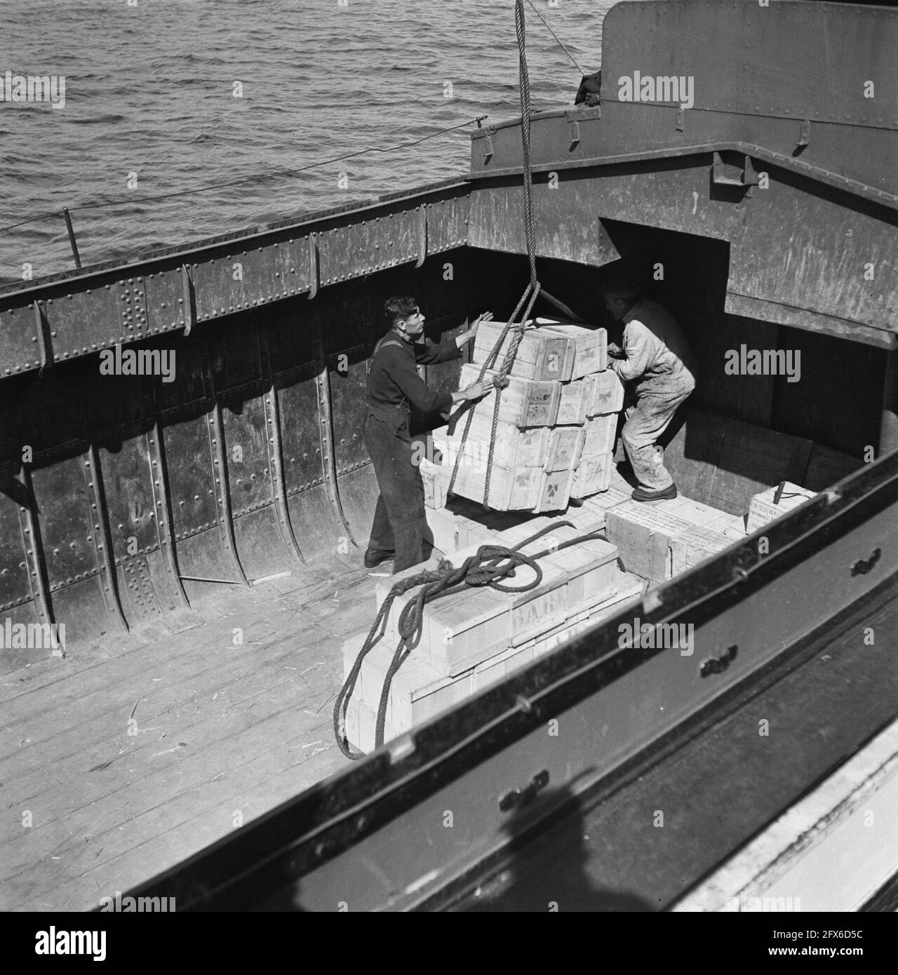 Freight ship unloading Black and White Stock Photos & Images - Alamy