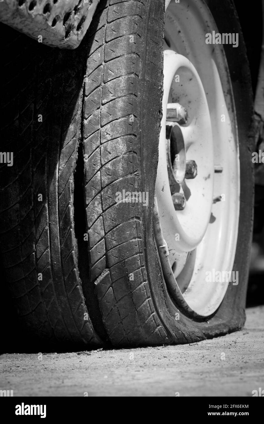 Teared off flat tire Stock Photo - Alamy