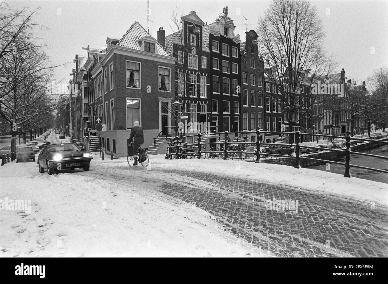 Heavy snowfall in the Netherlands (Amsterdam). Amsterdam canals in the ...