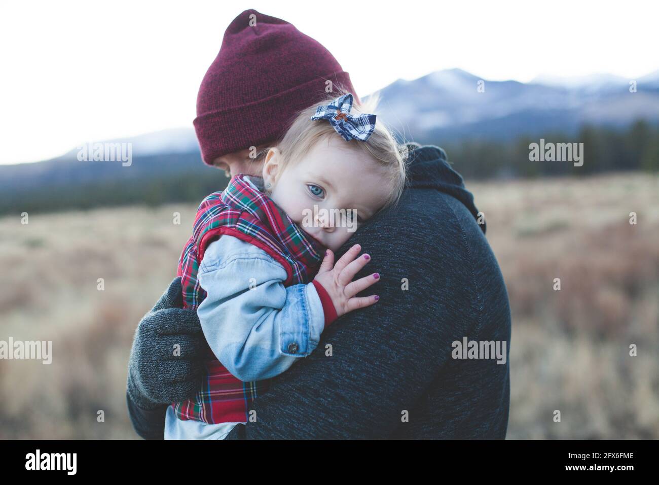 Child holding hands parents hi-res stock photography and images - Alamy