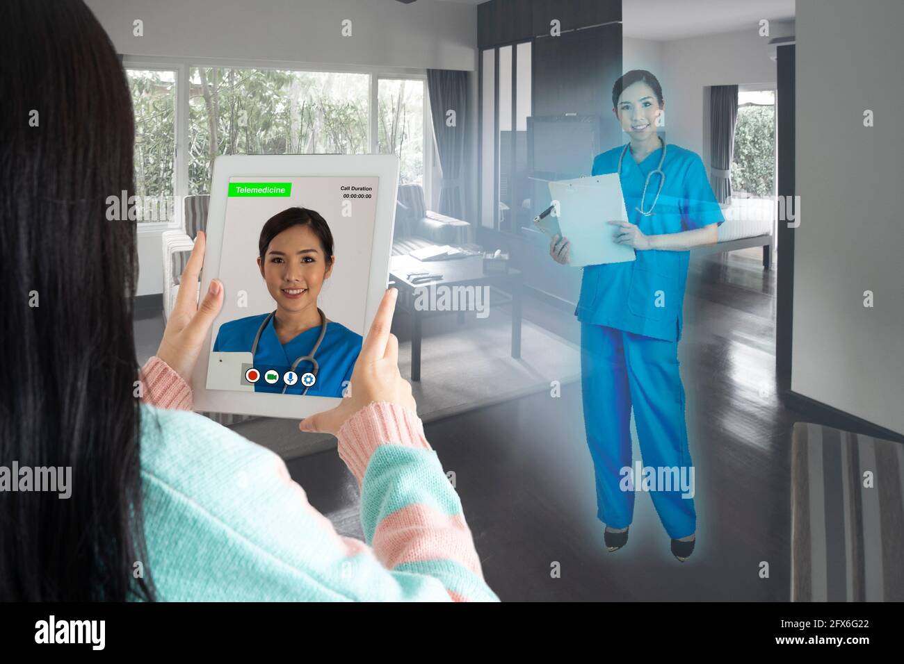 Patients using distance technology that showing doctor hologram to ...