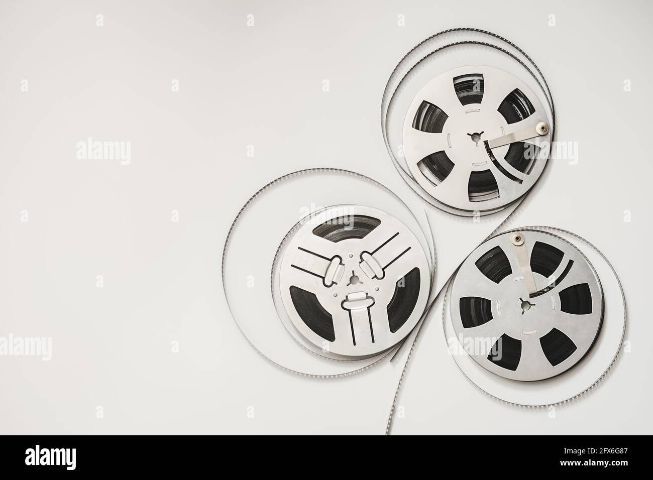 old Film Reel isolated on a white background Stock Photo - Alamy